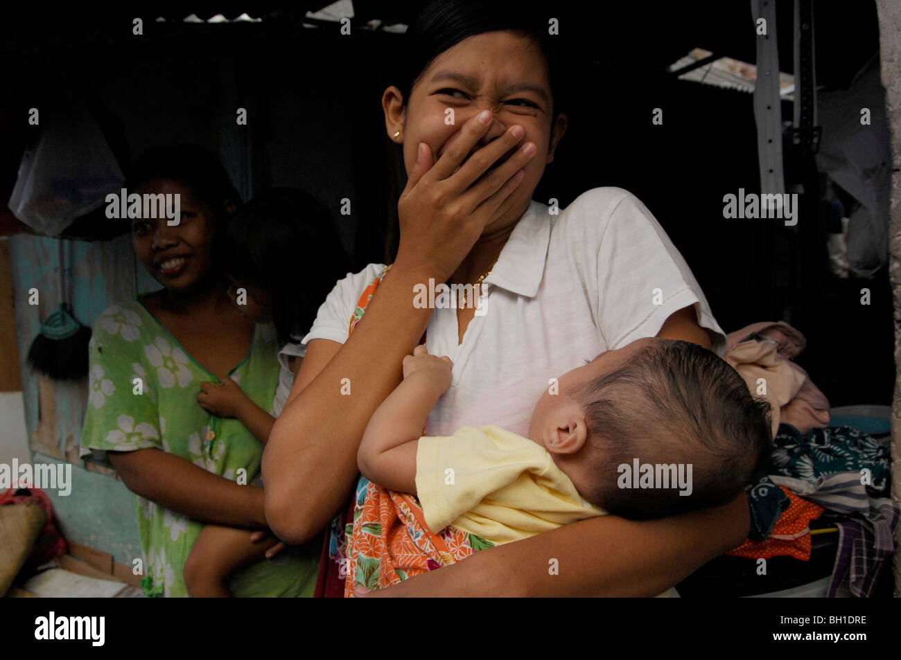maternitiers and thier children in kuta slum, Bali,Indonesia Stock ...