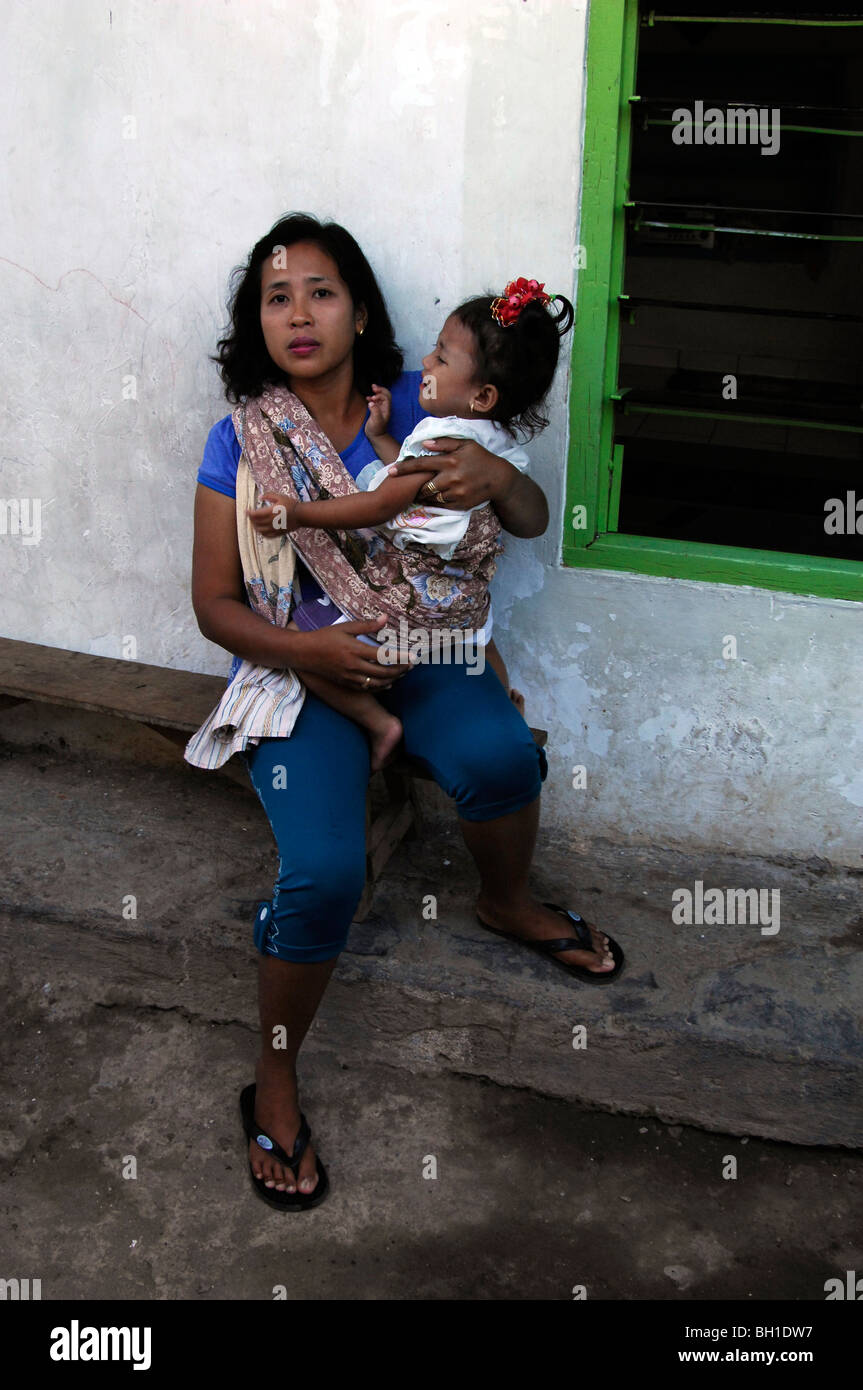 Mother and her little girl in slum, Bali,Indonesia Stock Photo - Alamy