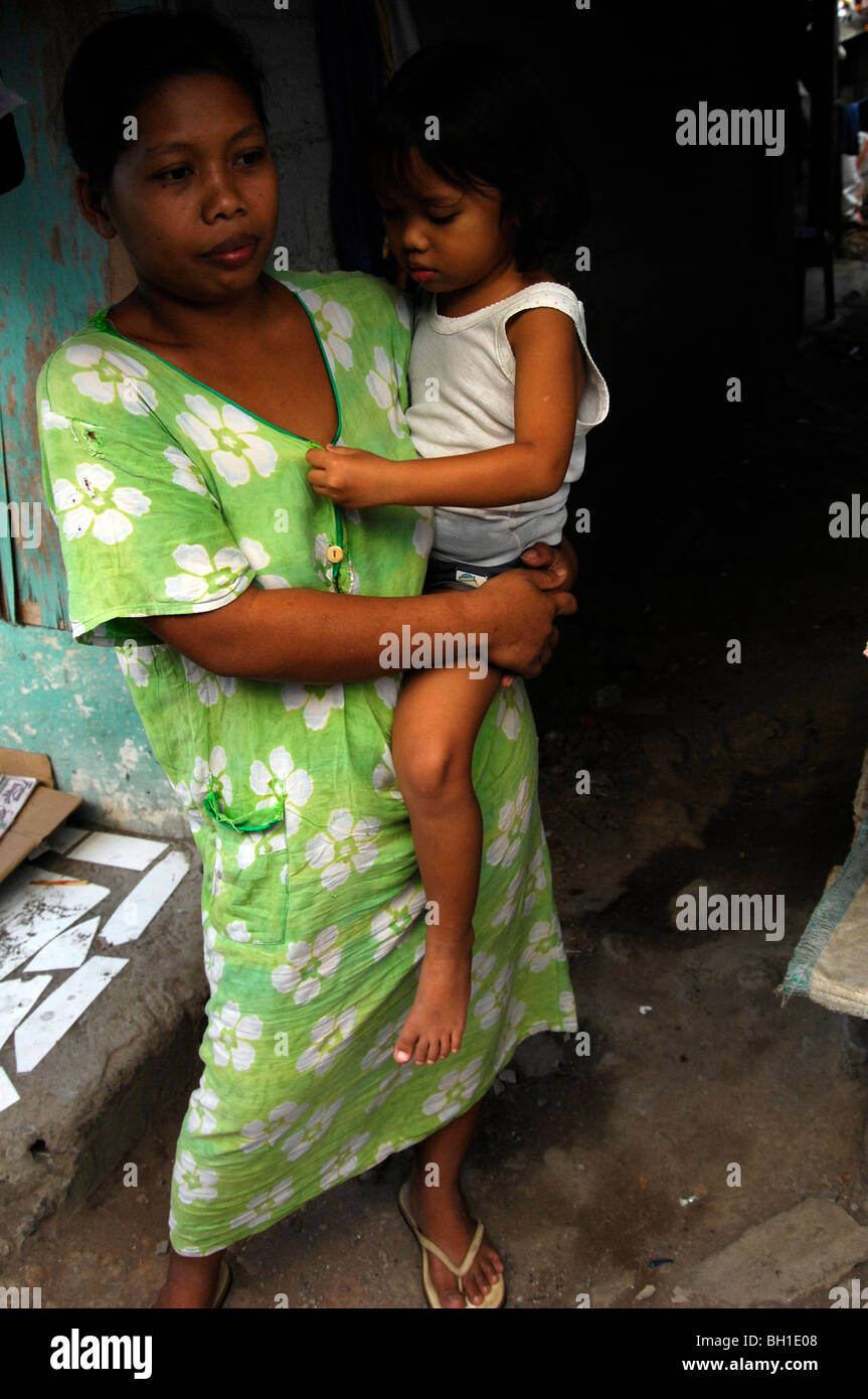 Mother and her little girl in slum, Bali,Indonesia Stock Photo - Alamy