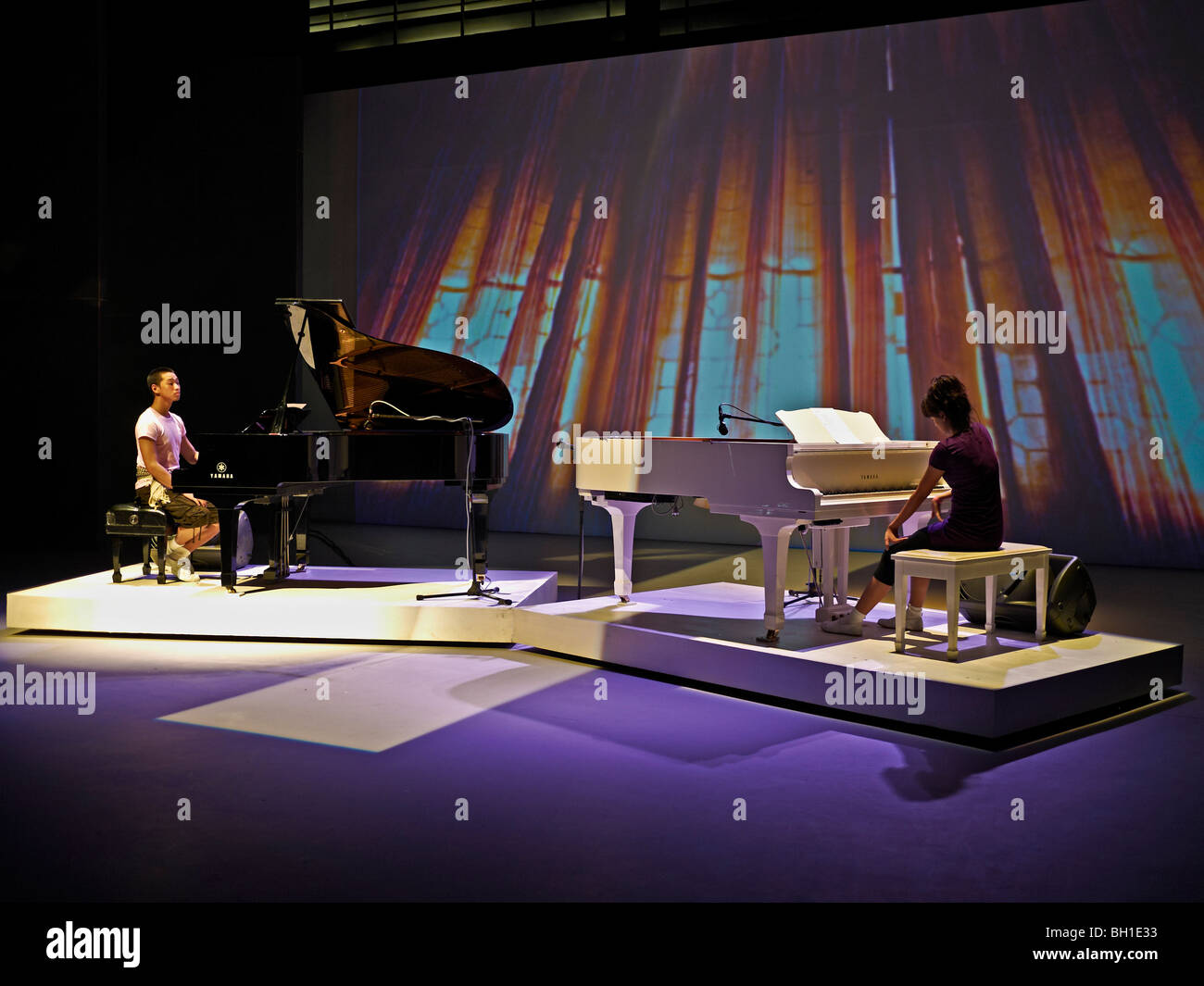 Concert pianists on stage at a Thai venue. Thailand S. E. Asia Stock ...