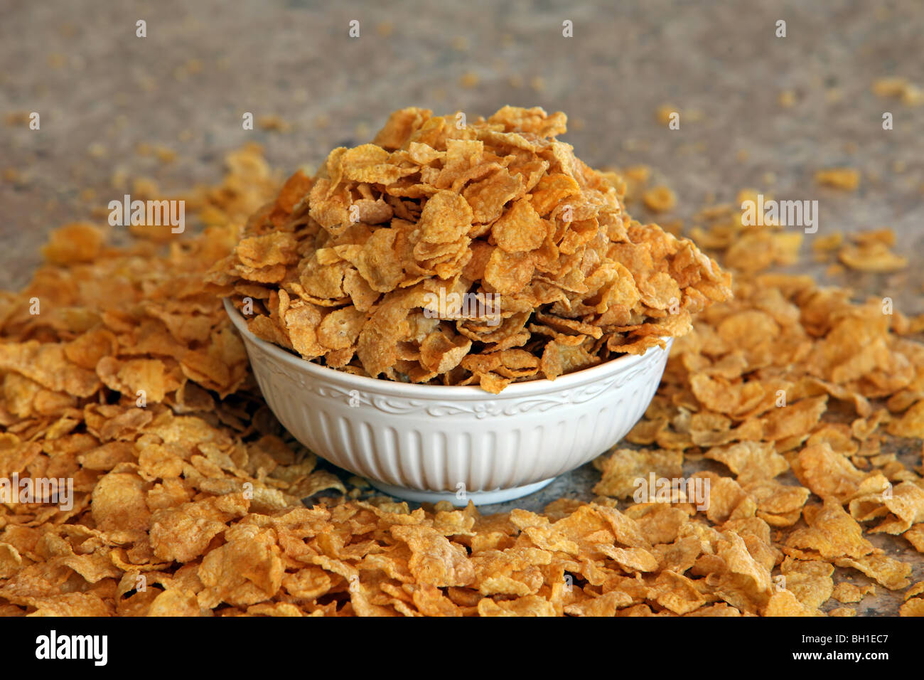 Cereal Corn Flake cereal being poured into a bowl Reverse motion from ...