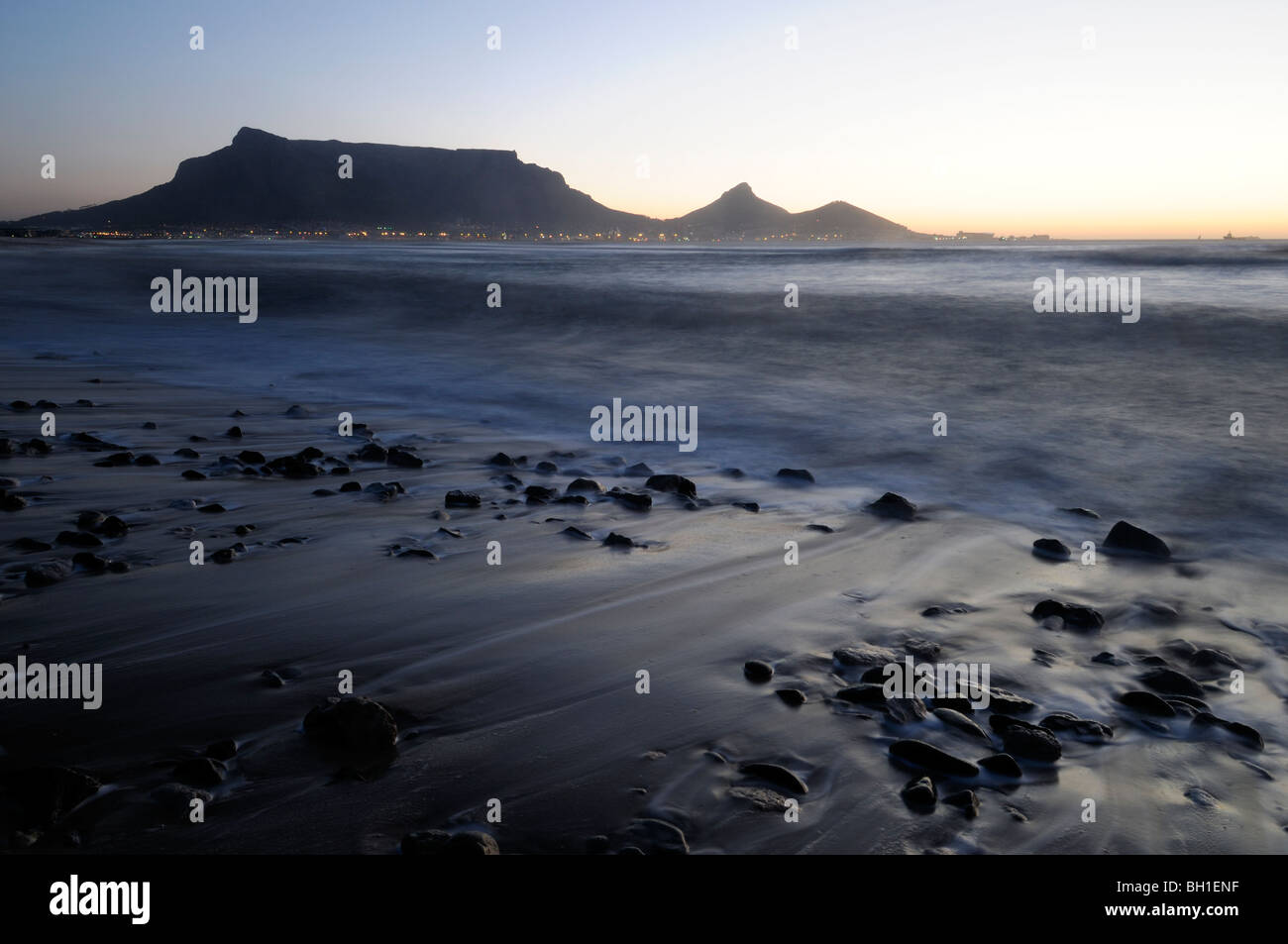 Table Mountain silhouetted during a glorious and dramatic sunset viewed ...