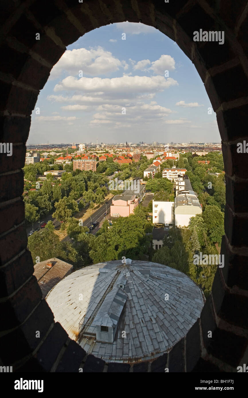 View through a window at water towers under clouded sky, Charlottenburg ...