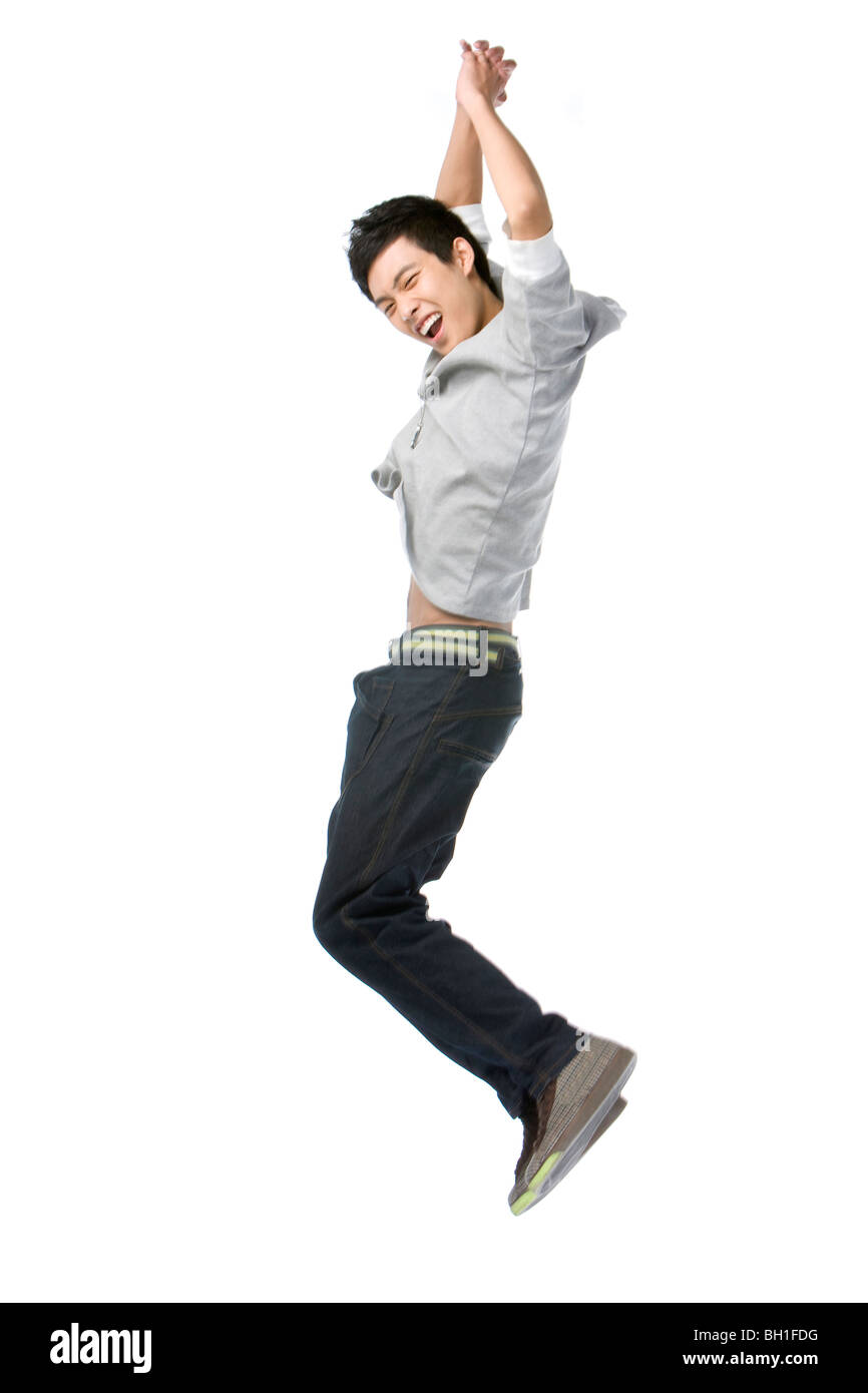 Young man dancing Stock Photo - Alamy