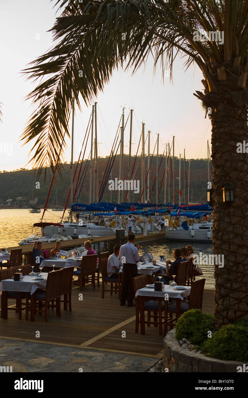 Restaurant at Fethiye marina at dusk, Fethiye, Turkey, Europe Stock ...