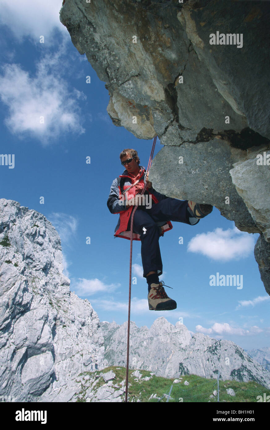 Man climbing to the summit of the Alpspitze, Garmisch, Upper Bavaria ...