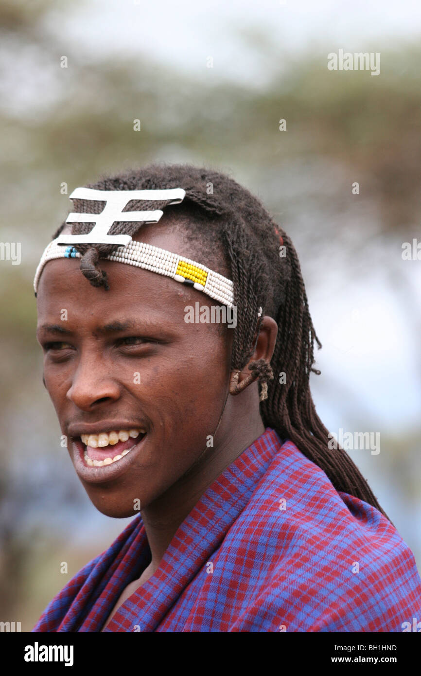Africa, Tanzania, Young Maasai man with head ornament an ethnic group ...