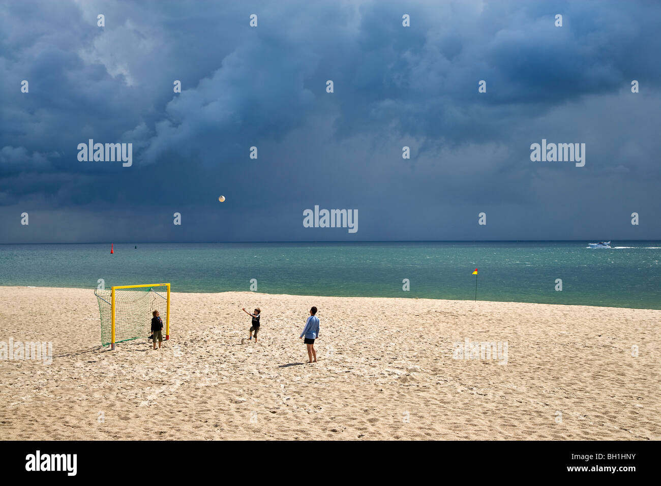 People playing soccer on beach of Hornum, Sylt Island, Schleswig ...