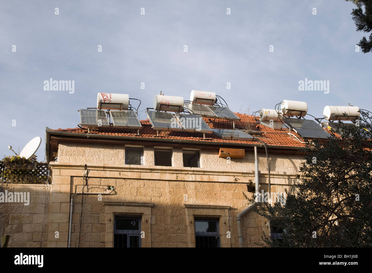 Israel, Jerusalem, Katamon neighbourhood, Solar water heaters on a roof ...