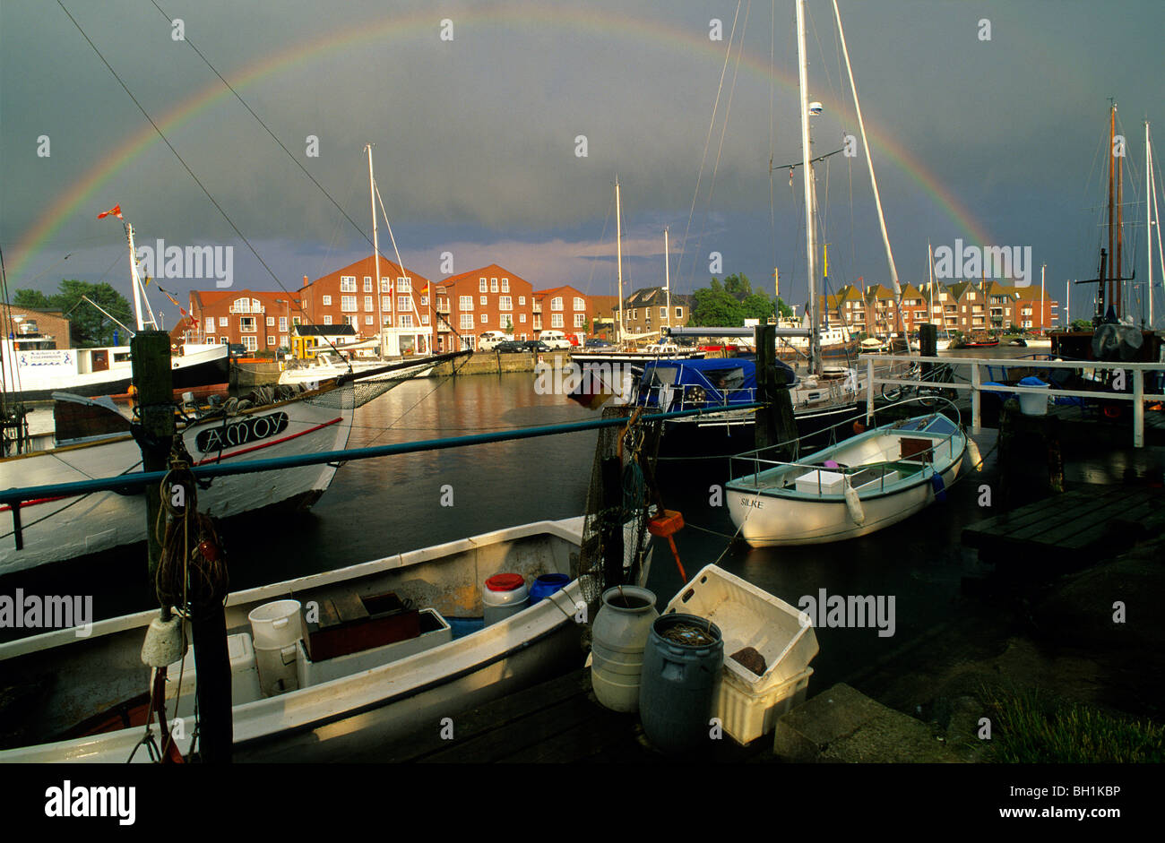 Rainbow over Orth harbour, Fehmarn island, Schleswig Holstein, Germany ...