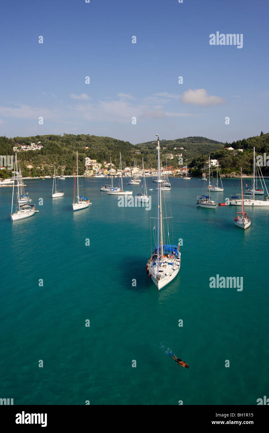 Boats anchoring off port Lakka, Paxos, Ionian Islands, Greece Stock ...