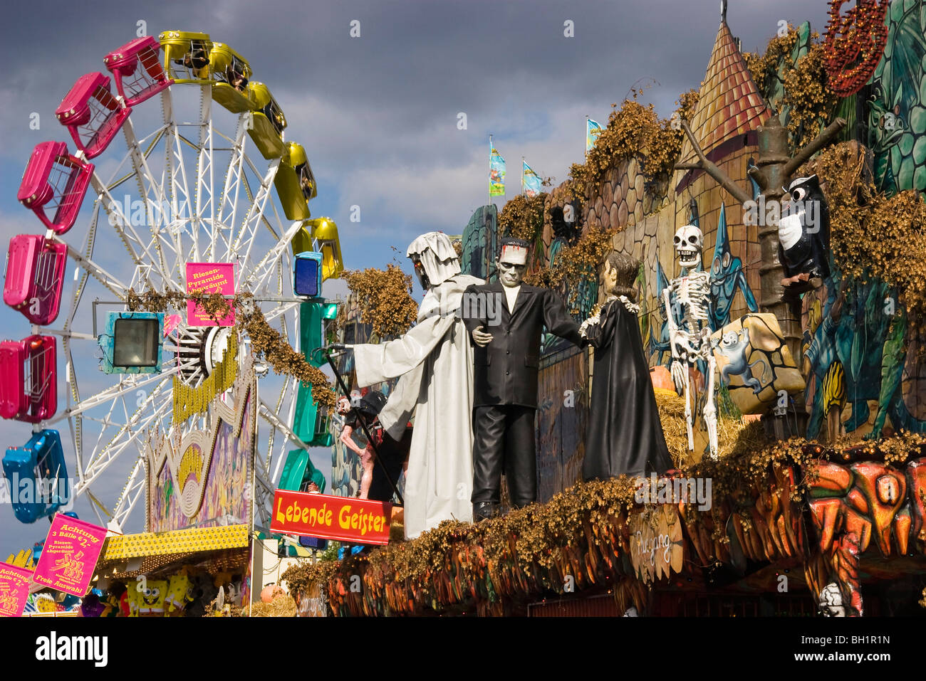 Ghost train and carrousel at Oktoberfest, Munich, Bavaria, Germany ...