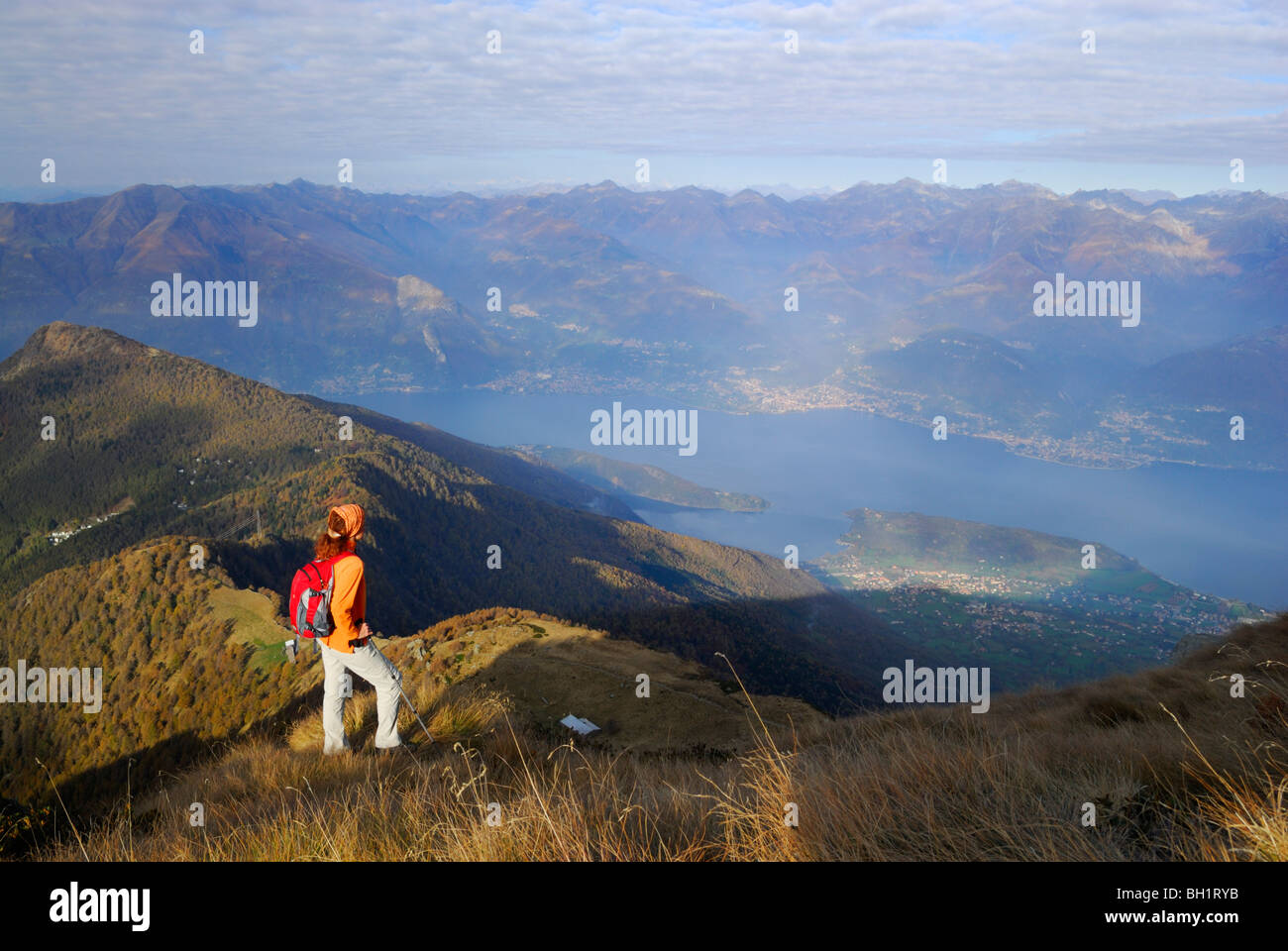 Woman enjoying view over lake Como, Monte Legnone, Bergamo Alps, Como ...