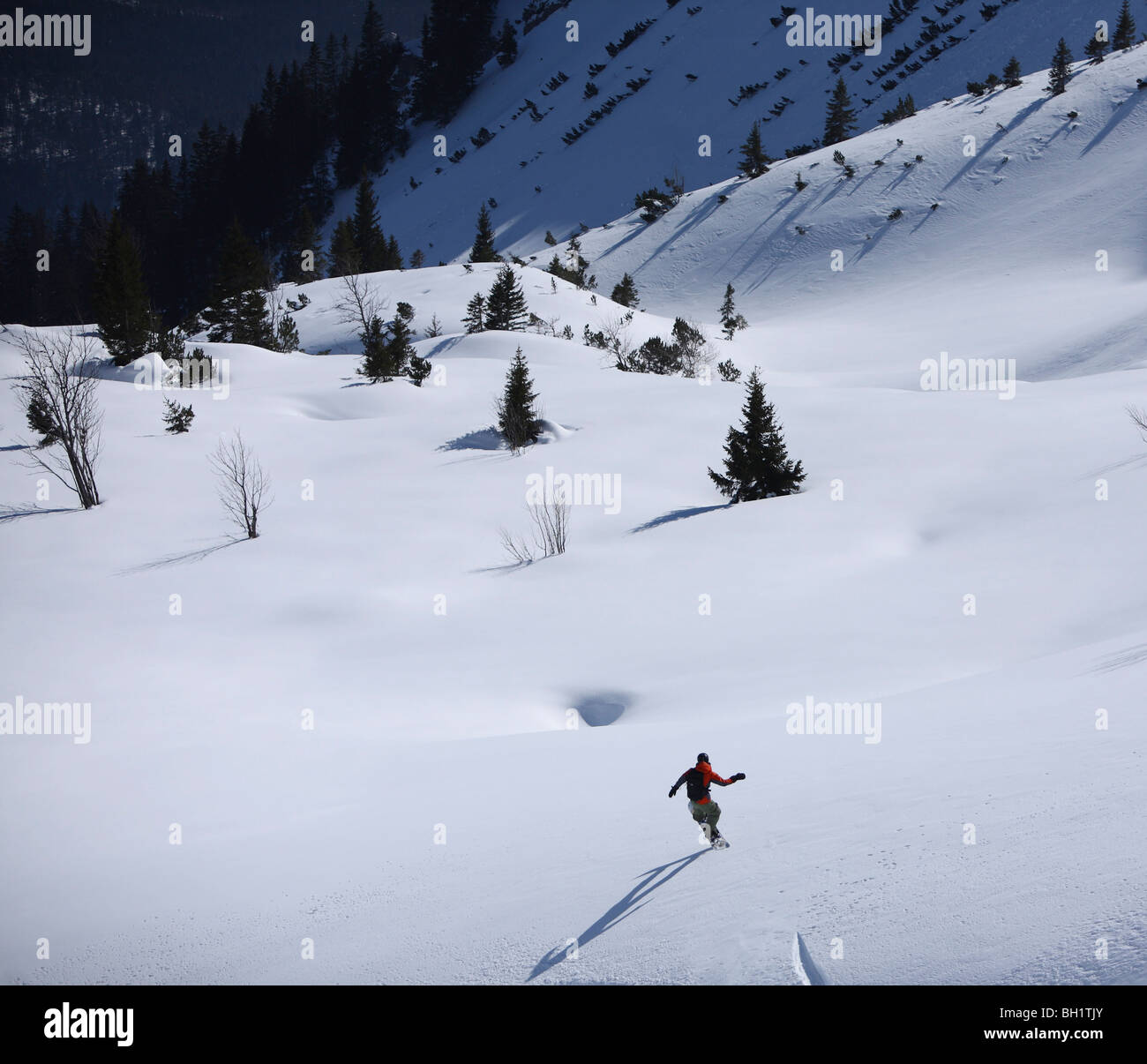 Young man riding his snowboard, Reutte, Tyrol, Austria Stock Photo - Alamy