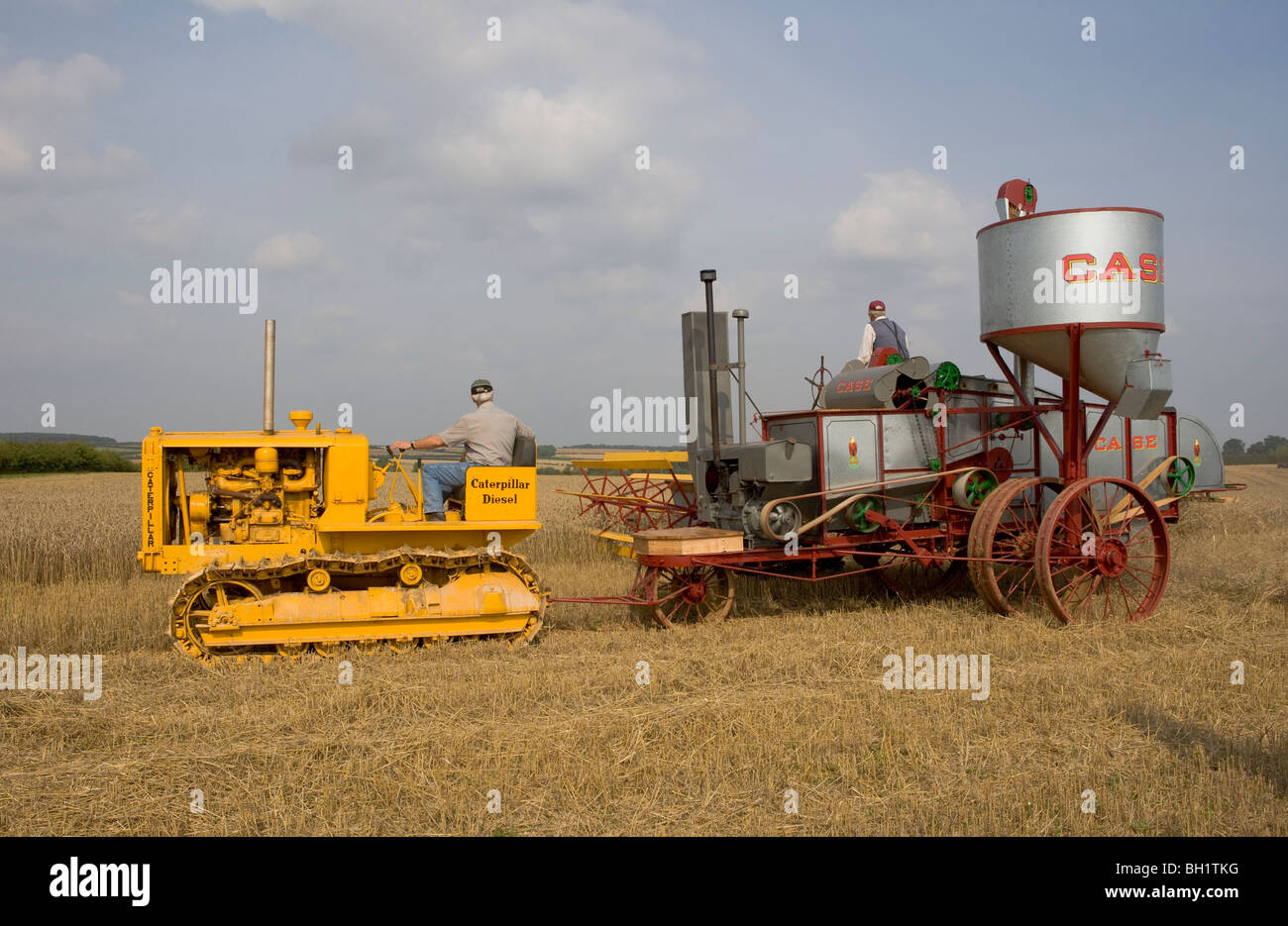 Caterpillar Diesel Forty and 1936 Case Q Combine Harvester Stock Photo ...