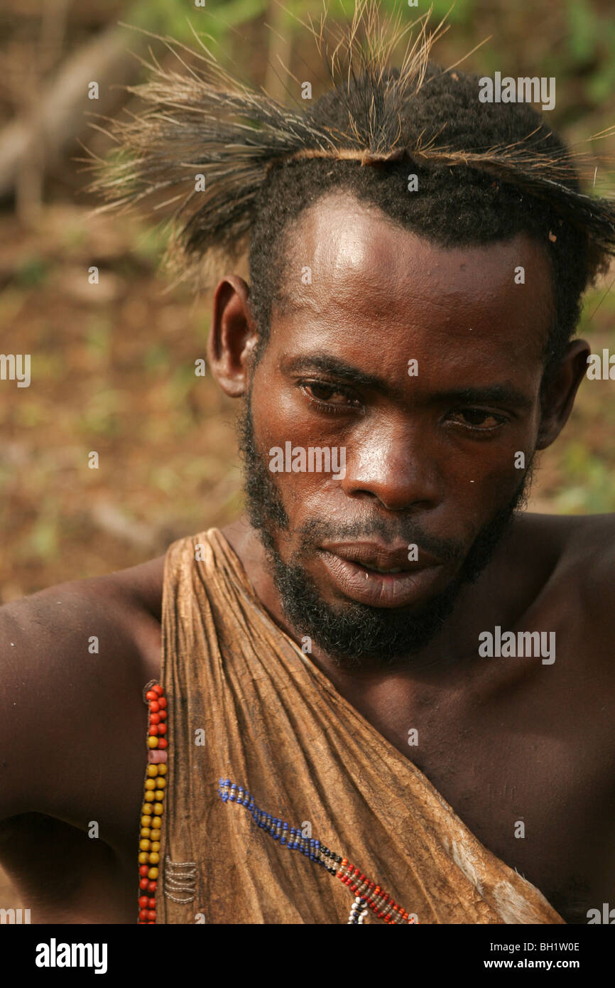 Africa, Tanzania, Lake Eyasi, portrait of a young Hadza male. A small ...