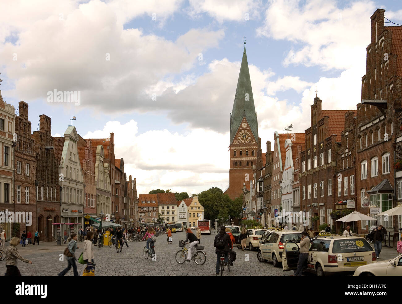 Gabled houses and St. Johannis Church Am Sande under clouded sky ...