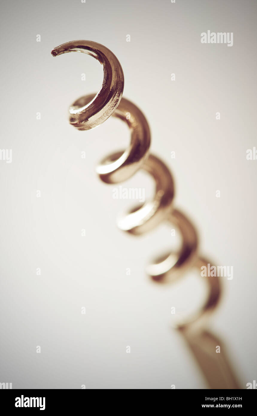 Corkscrew close up on white background Stock Photo - Alamy
