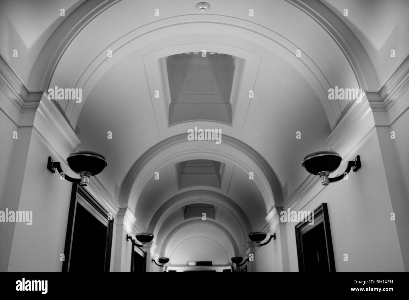 Elegant hallway with ornate arched ceiling and cornice work Stock Photo ...