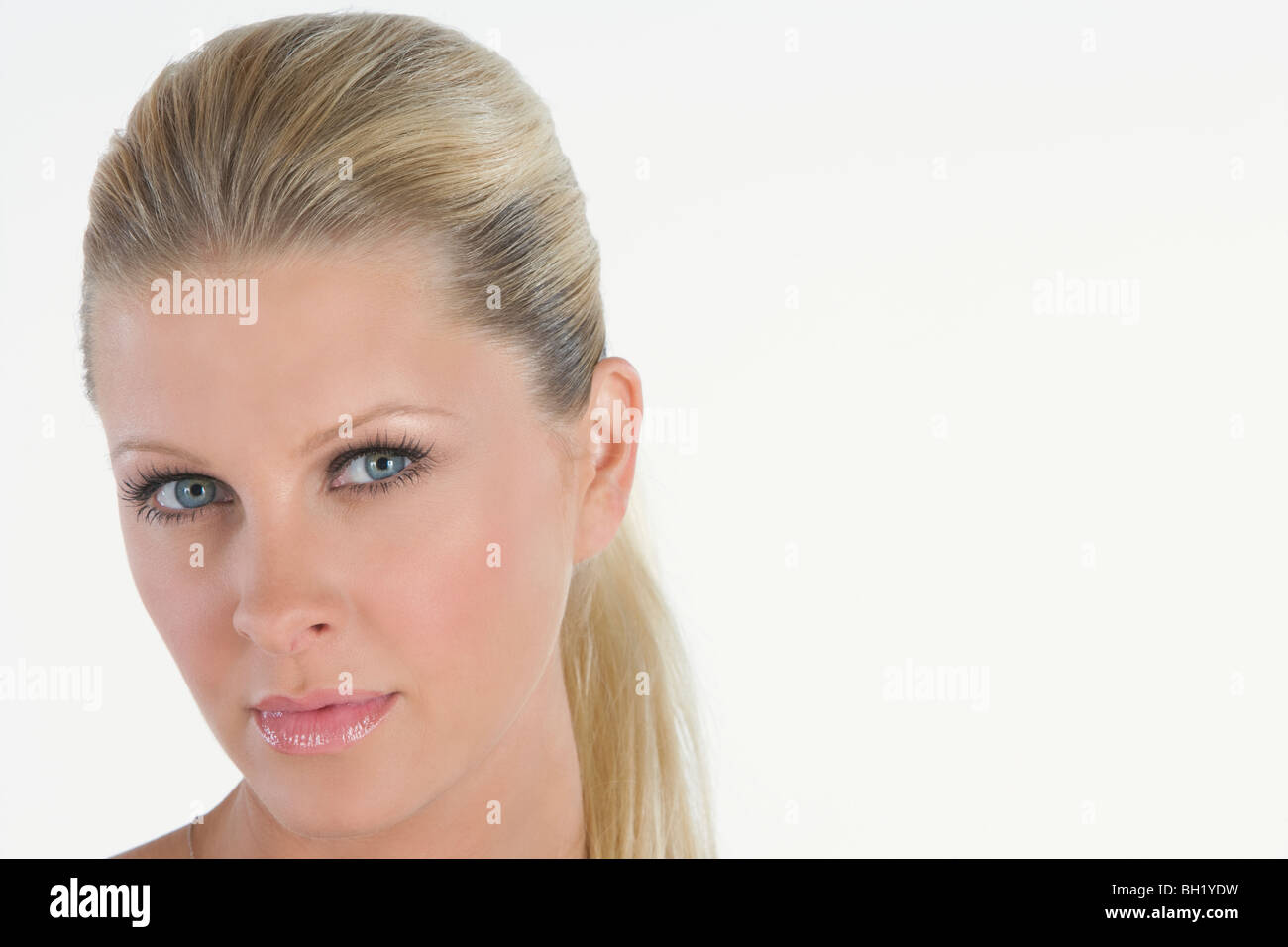 Portrait of woman with blonde ponytail Stock Photo - Alamy