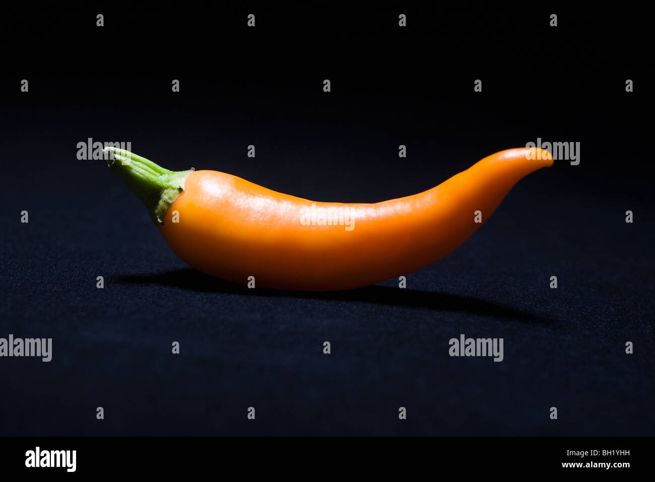 Orange chilli pepper Stock Photo - Alamy