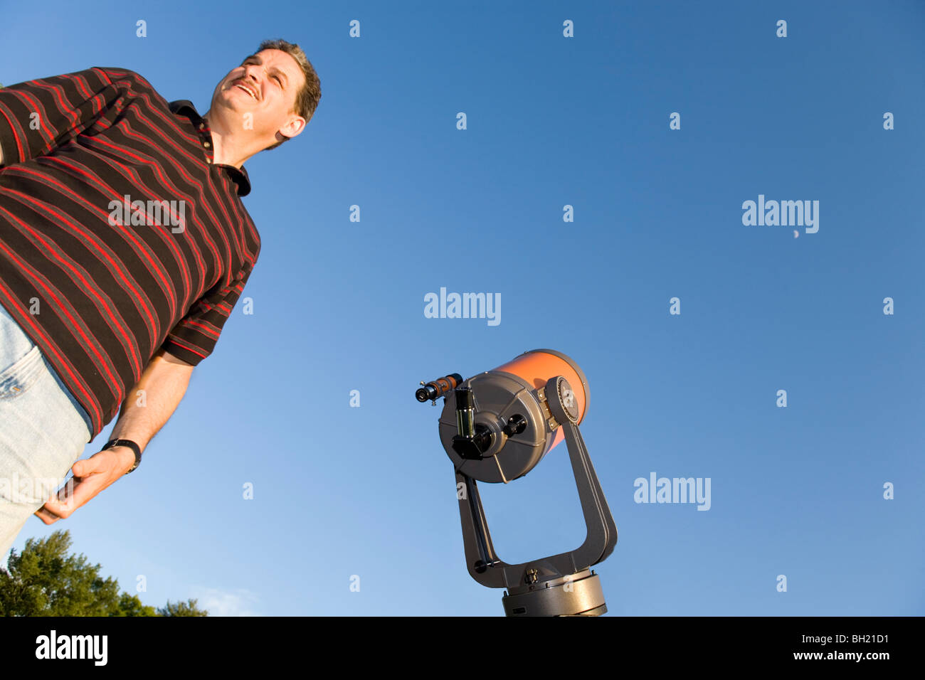 Man looking moon telescope hi-res stock photography and images - Alamy