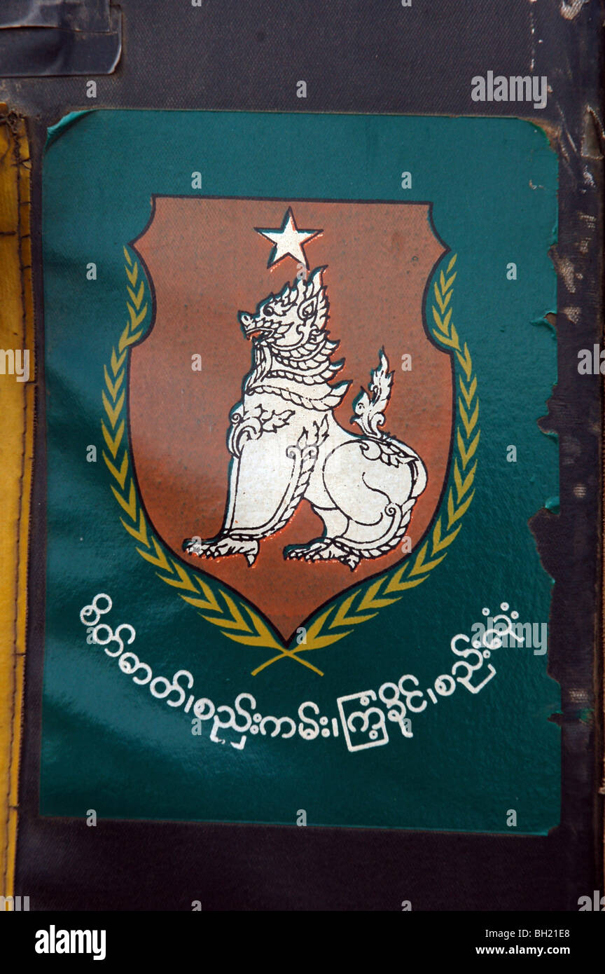 Burmese road signs and banners in Tachileik, MYANMAR Stock Photo - Alamy