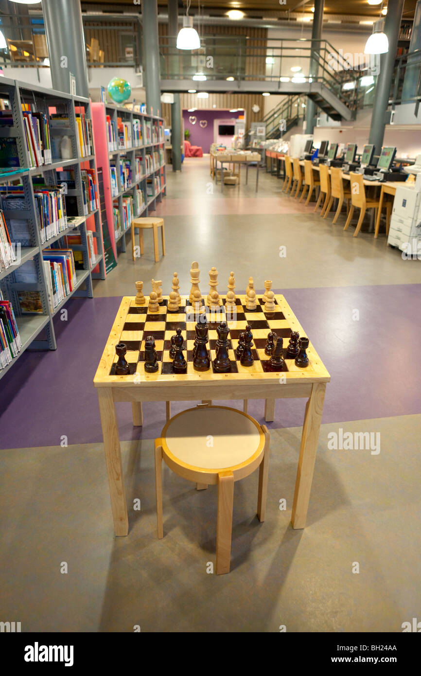 Chess-table in the library Stock Photo - Alamy