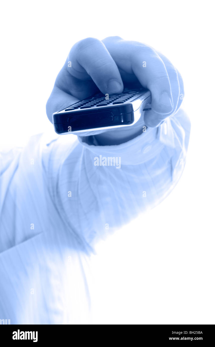 TV remote control device in hand Stock Photo - Alamy