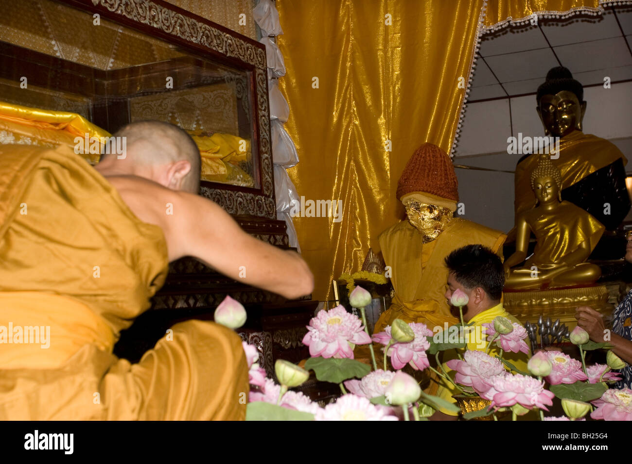Once a year, dead monk Luang Phoo Budda Thawaro at Wat Klang Si ...