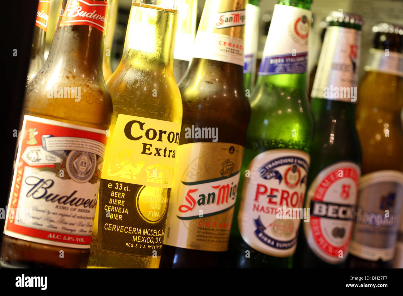 Row of bottle of various beers Stock Photo - Alamy