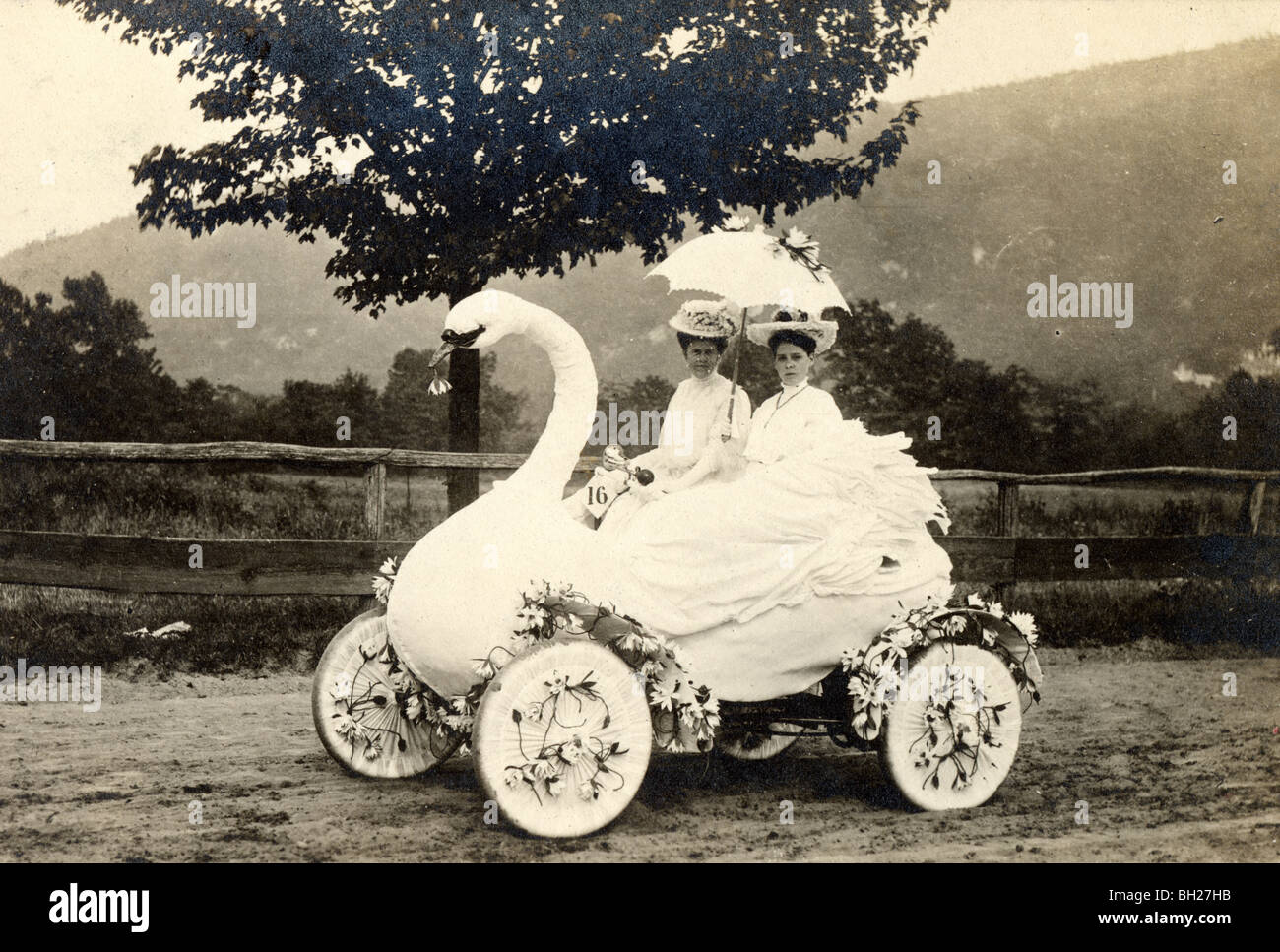 Two Women Driving Swan Automobile Parade Float Stock Photo - Alamy