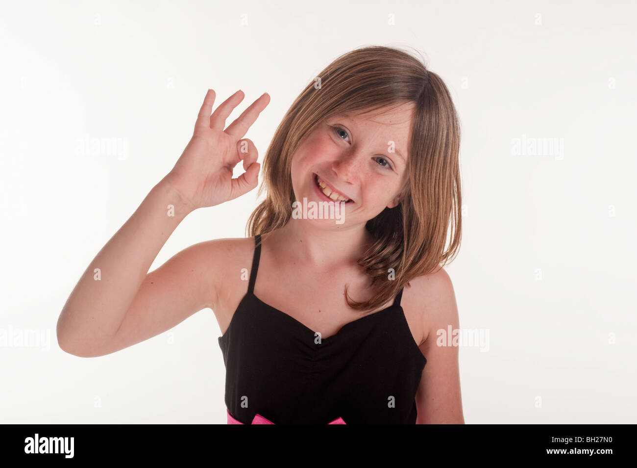 little girl making OK sign with hands Stock Photo - Alamy