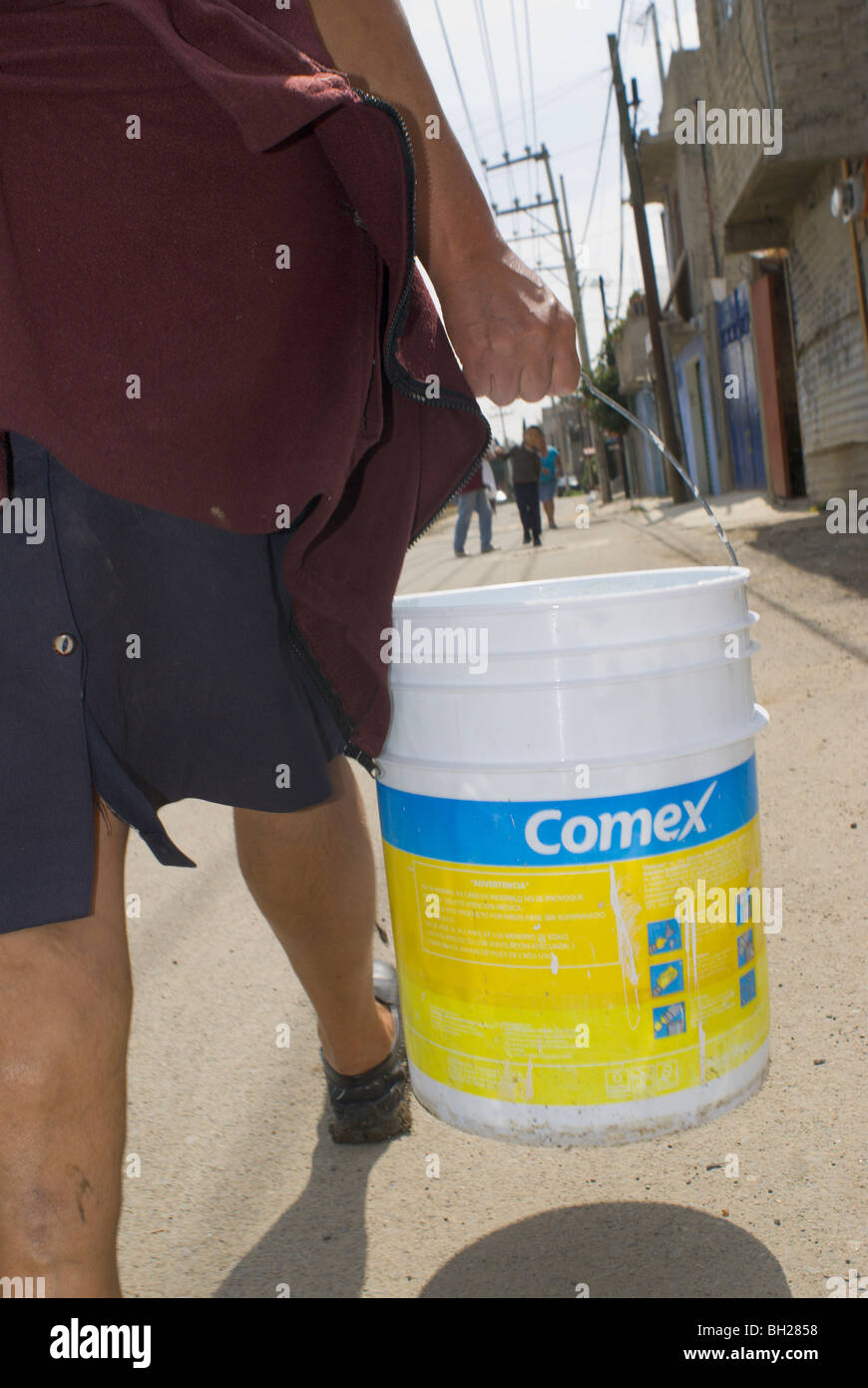 A hose attached to a free-flowing spring provides the barrio of San ...