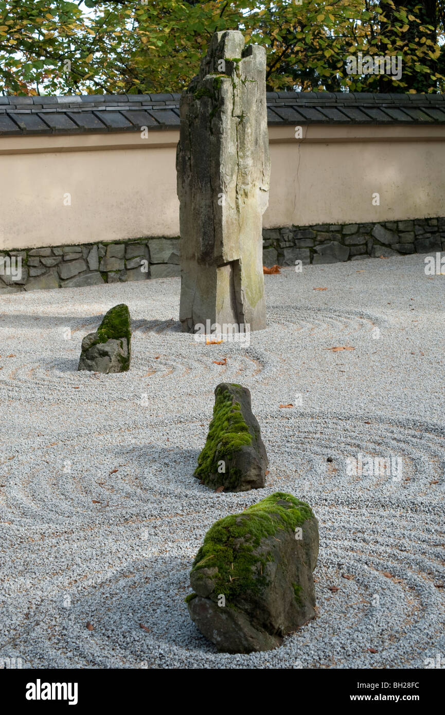Stone garden shaped like waves in a japanese garden Stock Photo - Alamy