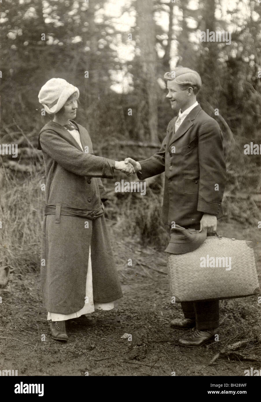 Boy and girl saying goodbye hi-res stock photography and images - Alamy