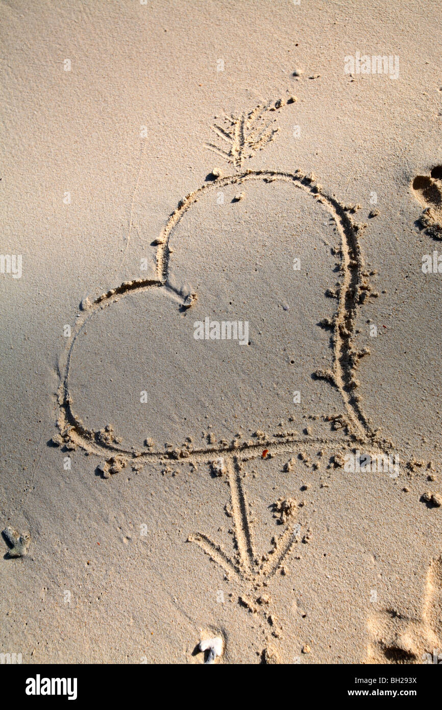 Love message drawn in the sand Stock Photo - Alamy