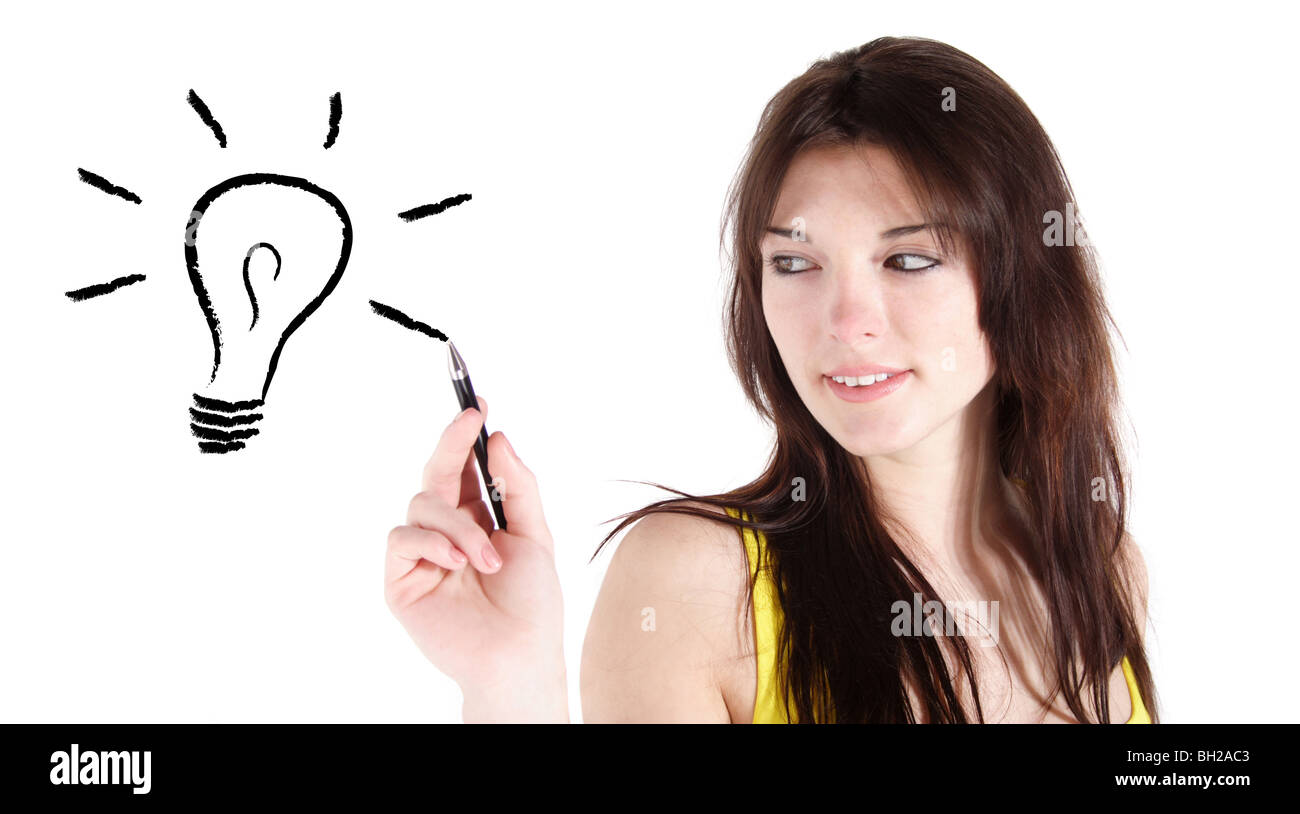 An attractive young woman sketching a stylized light bulb. All isolated ...