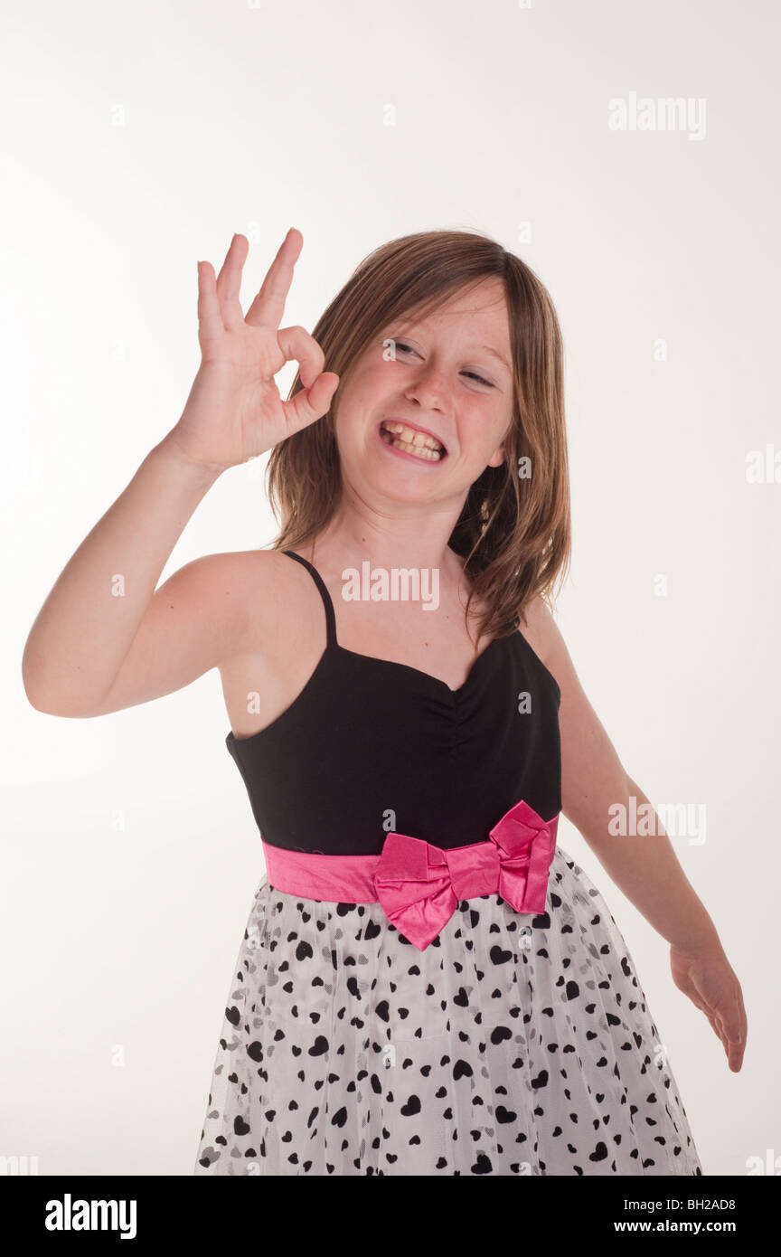 little girl making OK sign with hands Stock Photo - Alamy