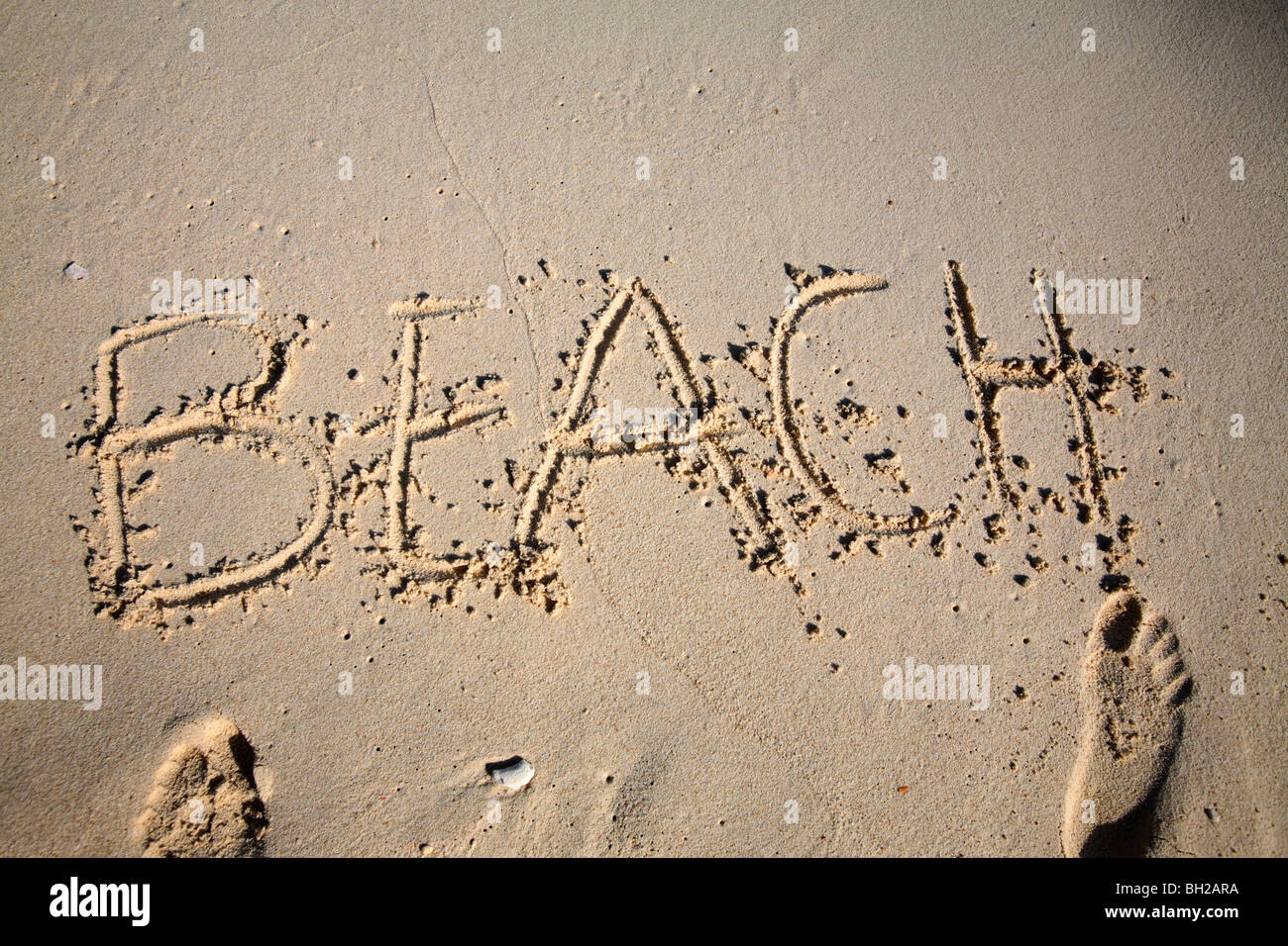 beach word drawn in the sand Stock Photo - Alamy