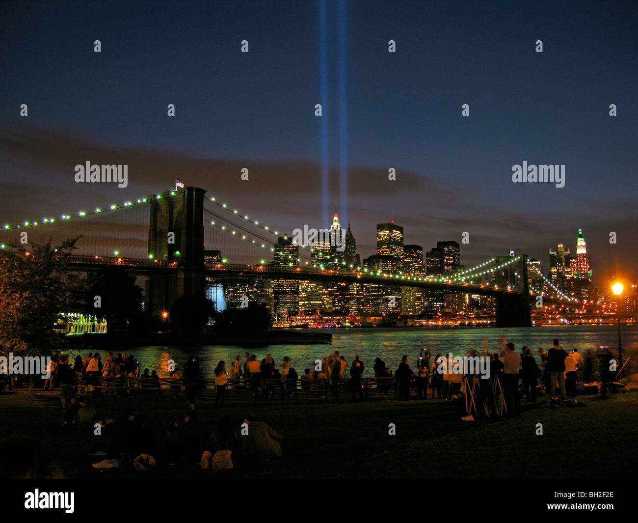 Brooklyn Bridge and 9/11 memorial blue light Stock Photo - Alamy