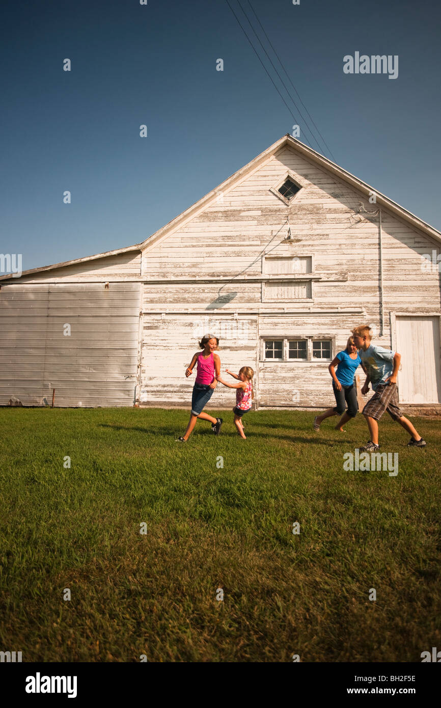Children playing in farmyard hi-res stock photography and images - Alamy