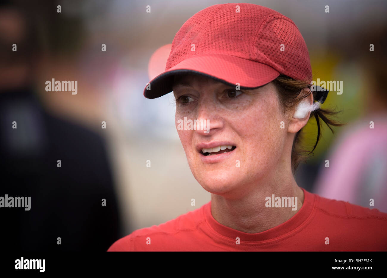 Portrait of middle aged male runner with white cap, Regina ...