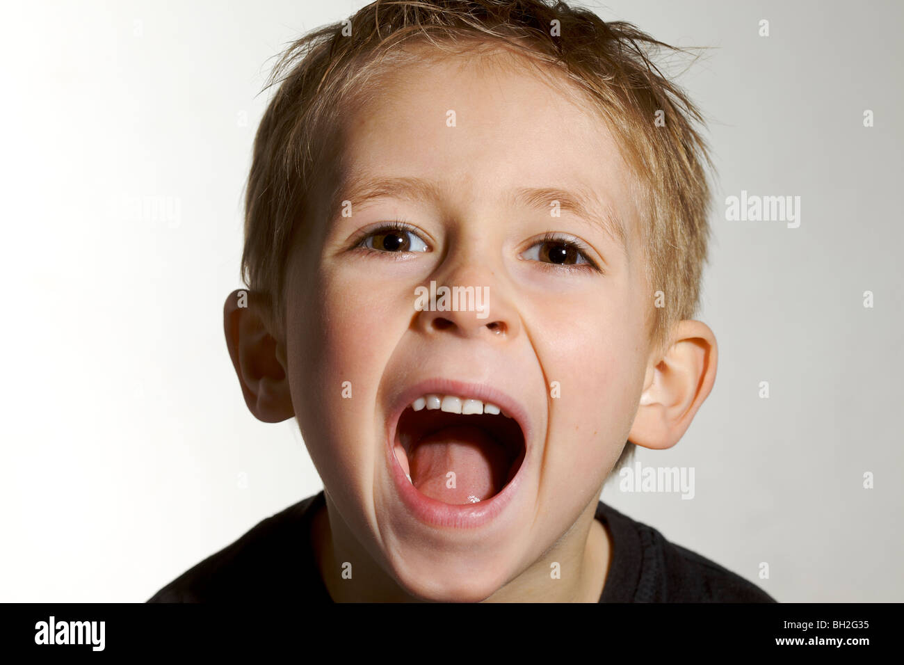 Young boy happy smiling angry shouting screaming sad scared terrified ...