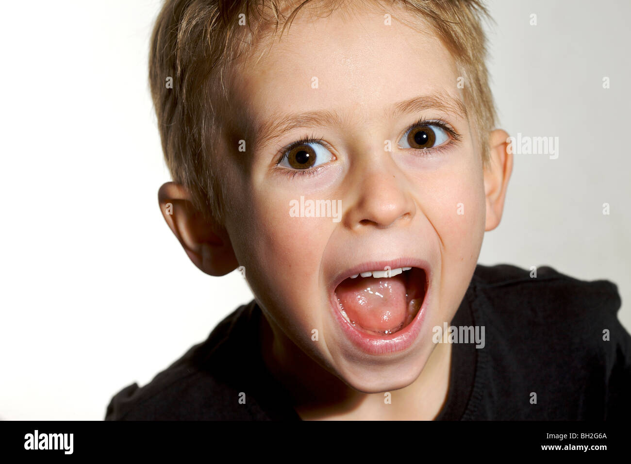 Young boy happy smiling angry shouting screaming sad scared terrified ...