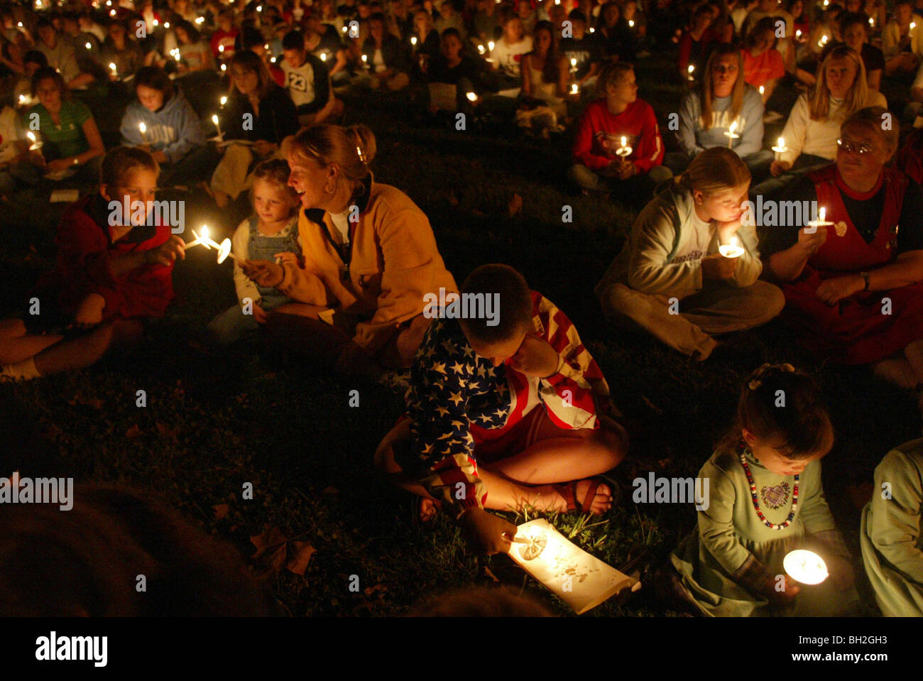 Hundreds attend a candlelight ceremony and interfaith rememberance on ...