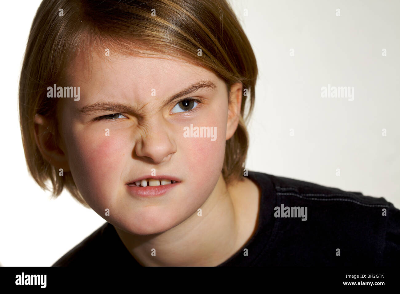 Young girl shouting screaming shocked alarmed scared surprised ...