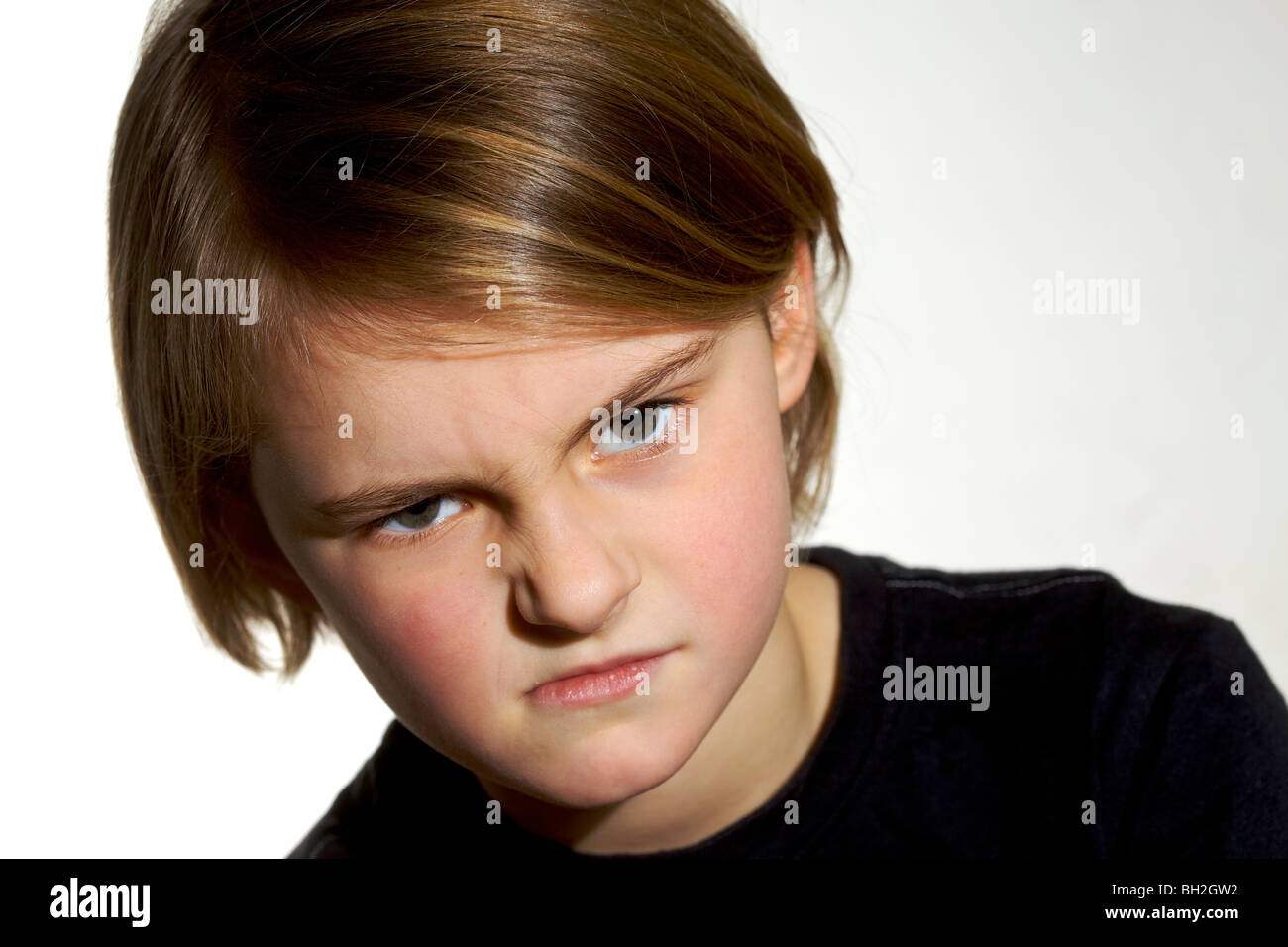 Young girl shouting screaming shocked alarmed scared surprised ...