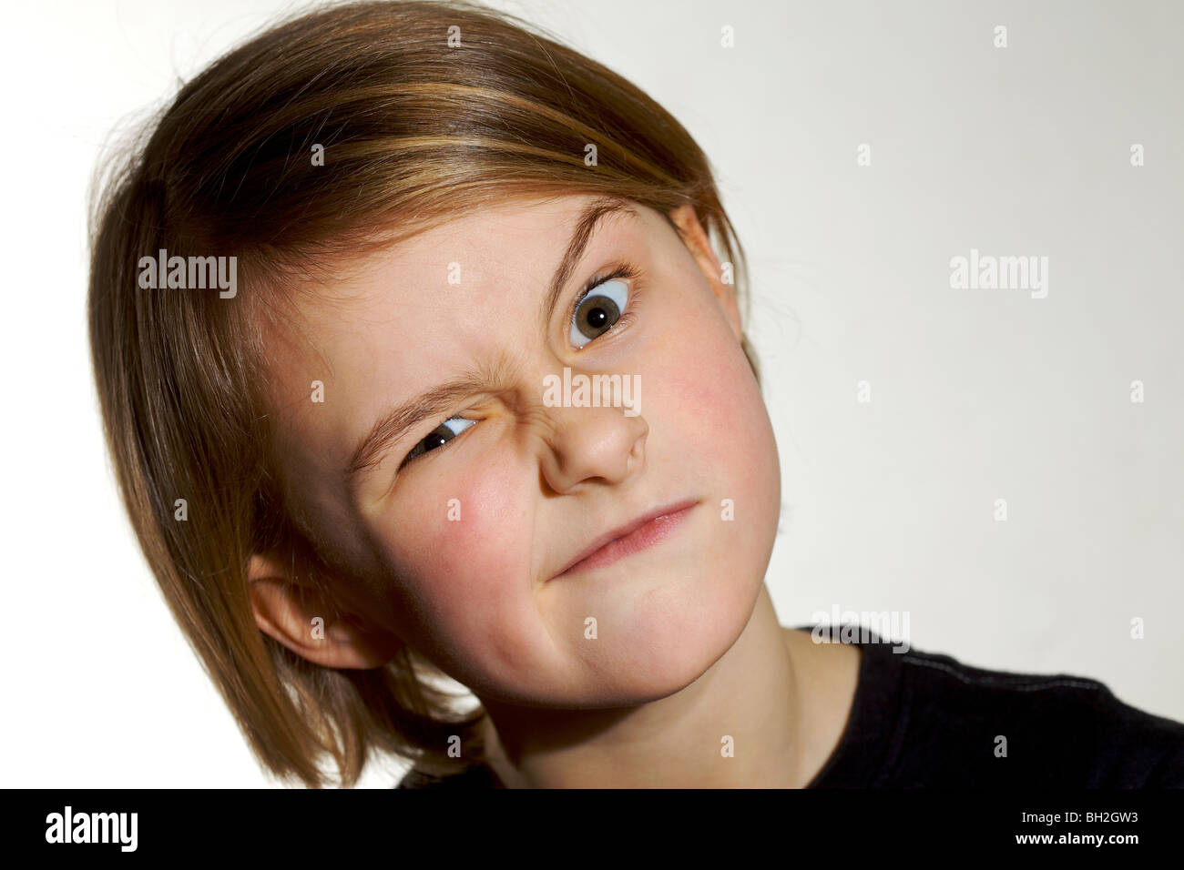 Young girl shouting screaming shocked alarmed scared surprised ...