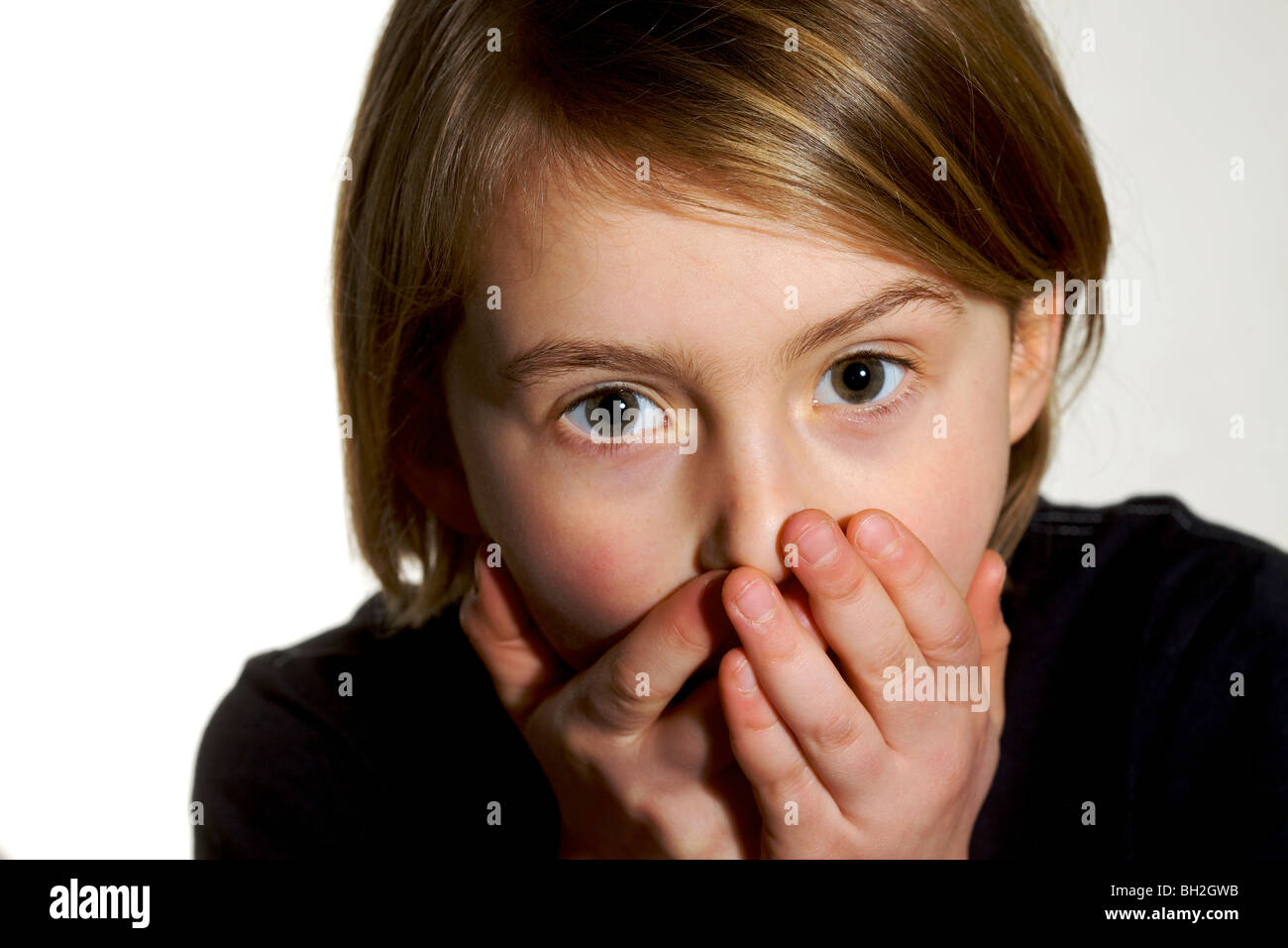 Young girl shouting screaming shocked alarmed scared surprised ...